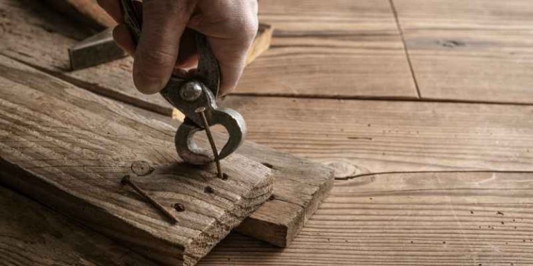 How To Remove Buried Nails From Wood: Expert Tips For Effortless Removal